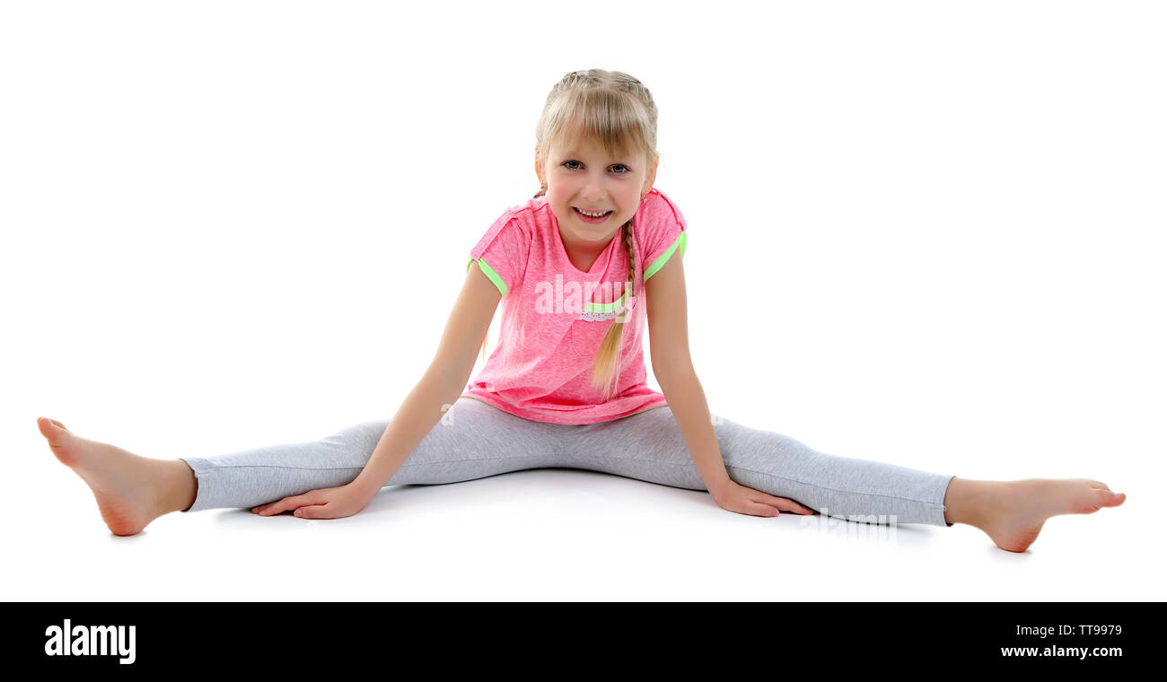 Cute little girl doing splits Cut Out Stock Images & Pictures - Alamy