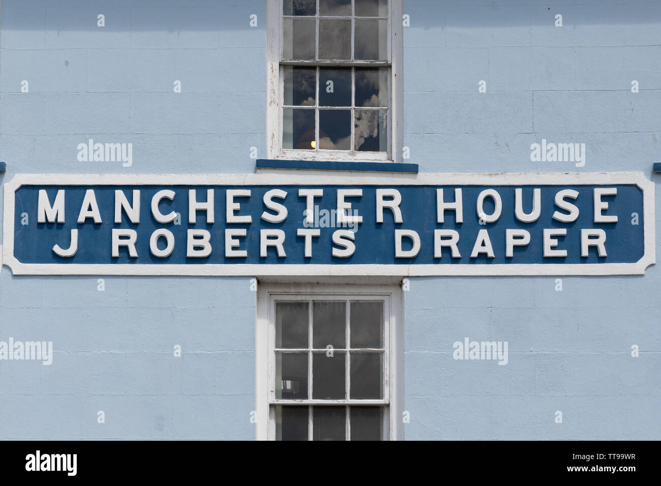 Former business Manchester House J Roberts Draper shop sign on a ...