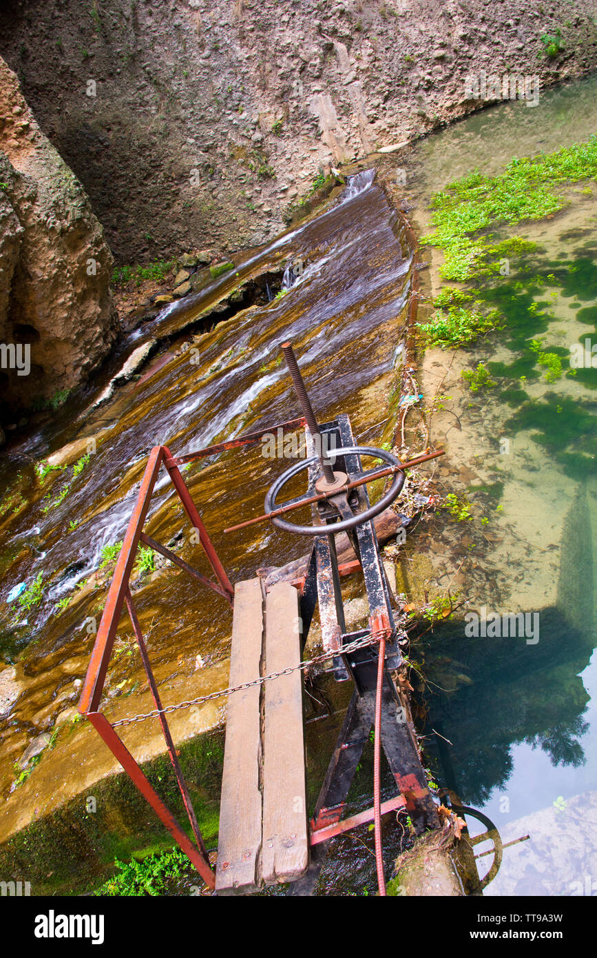 irrigation sluice system with rusty shutoff wheel in ronda, andalusia ...