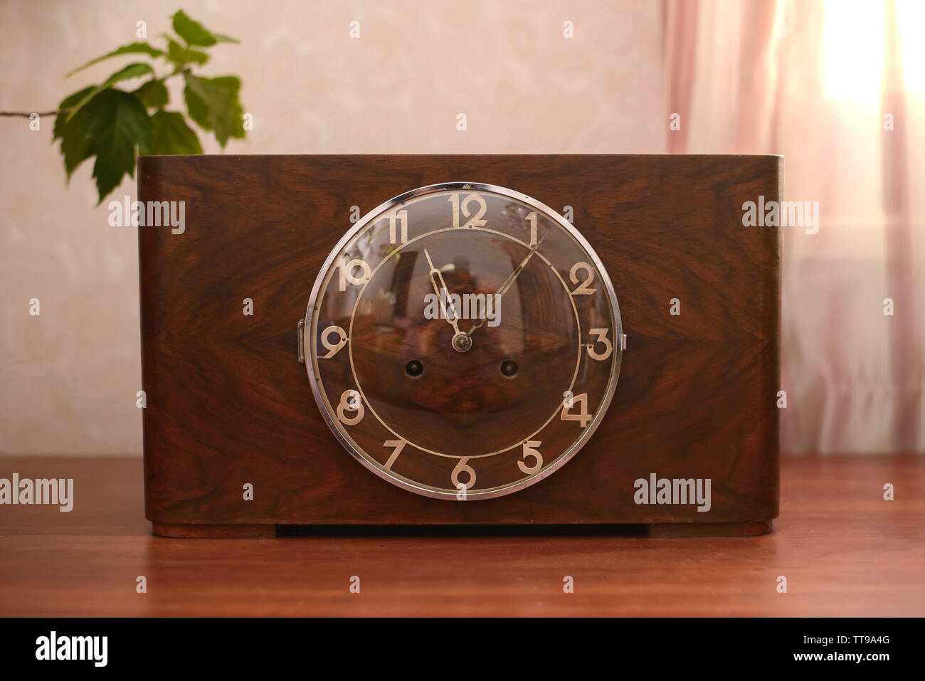 Vintage old table clock in wooden case with glass lid Stock Photo - Alamy