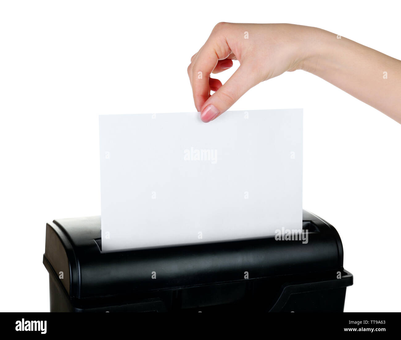 Female hand destroying sheet of paper with shredder isolated on white ...