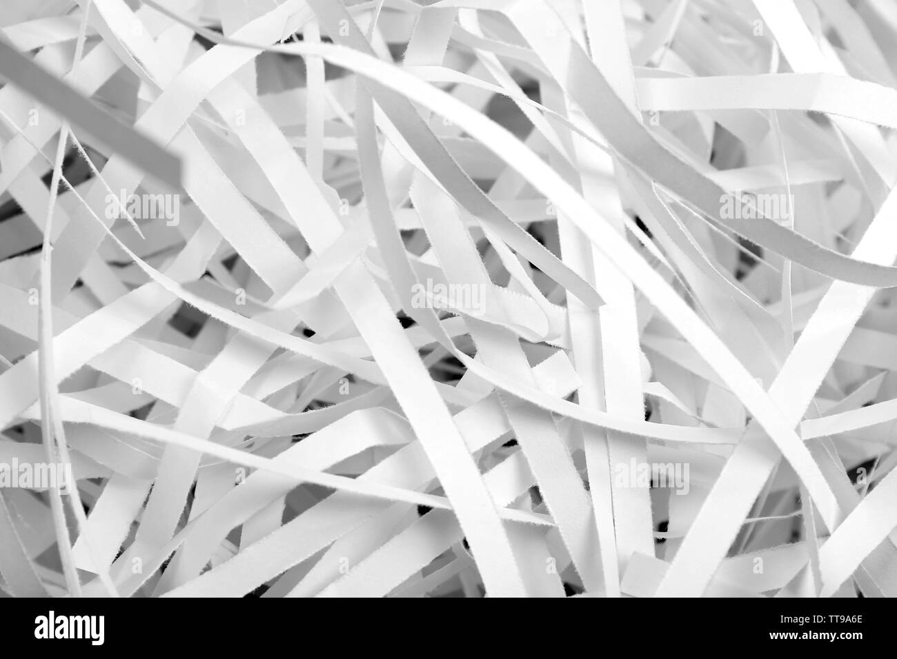 Strips of destroyed paper from shredder, closeup Stock Photo - Alamy