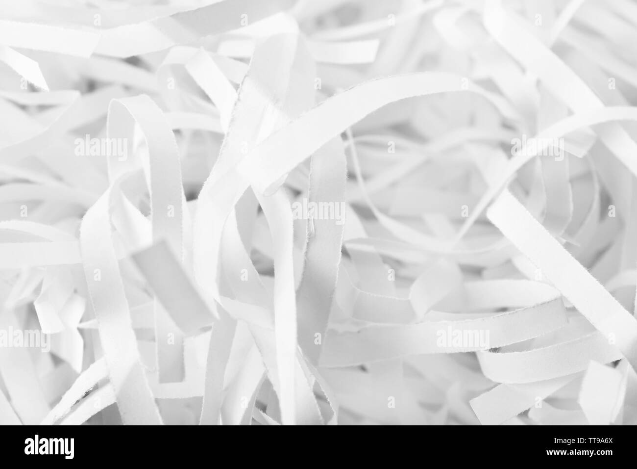 Strips of destroyed paper from shredder, closeup Stock Photo - Alamy