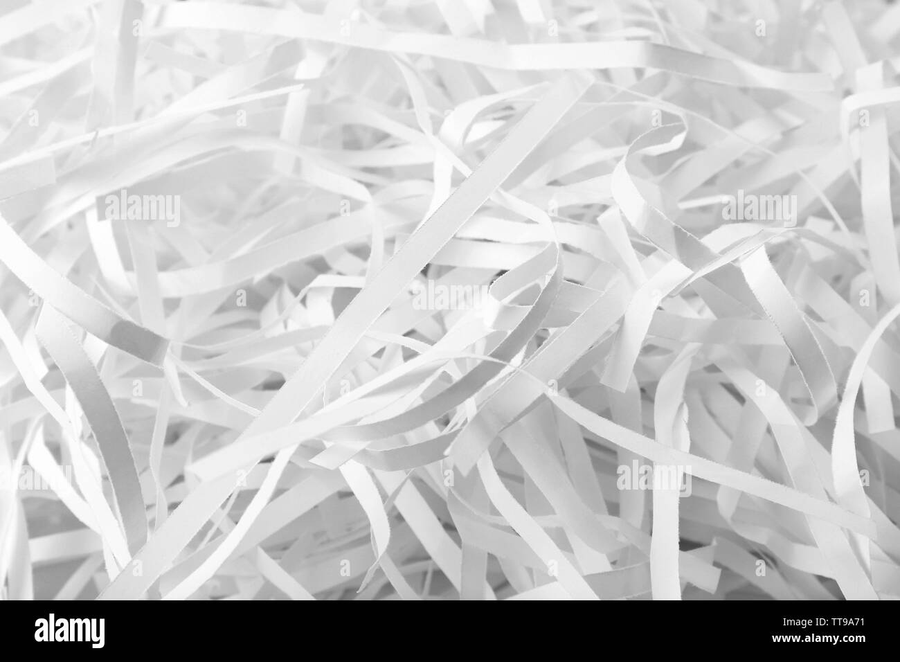 Strips of destroyed paper from shredder, closeup Stock Photo - Alamy