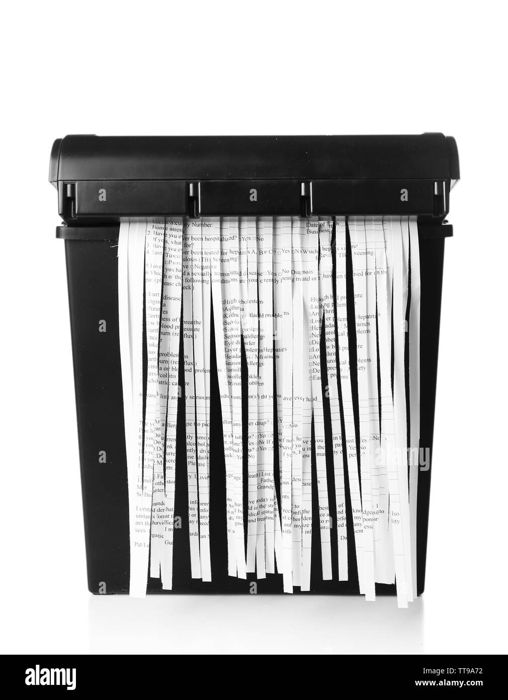 Strips of destroyed paper from shredder isolated on white Stock Photo ...