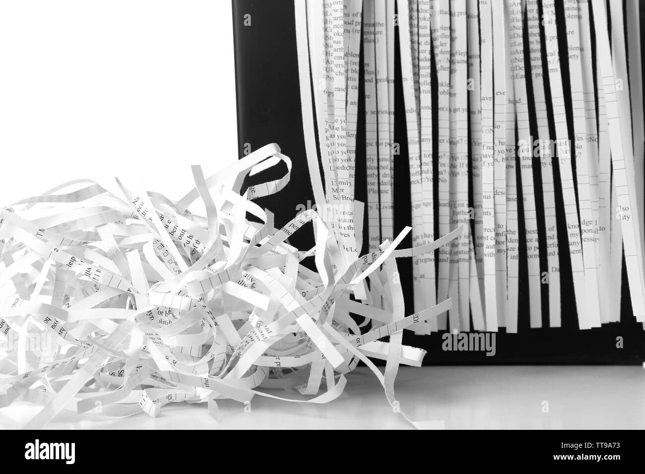 Strips of destroyed paper from shredder, closeup Stock Photo - Alamy