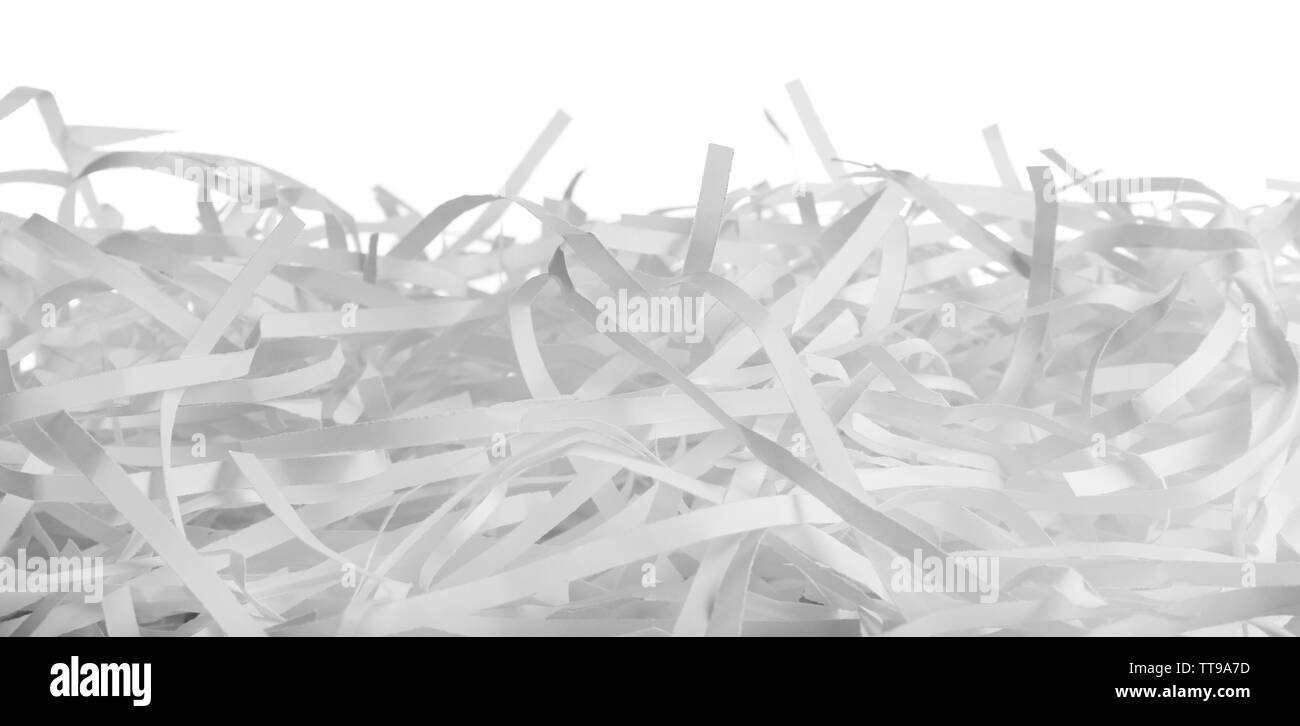 Strips of destroyed paper from shredder isolated on white Stock Photo ...