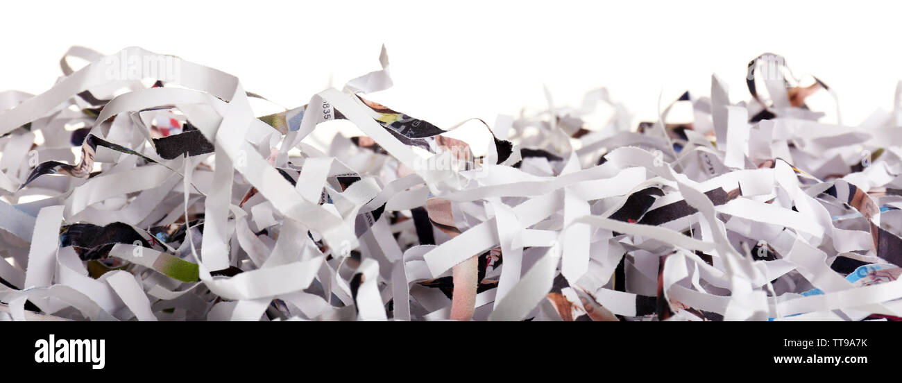 Strips of destroyed paper from shredder isolated on white Stock Photo ...