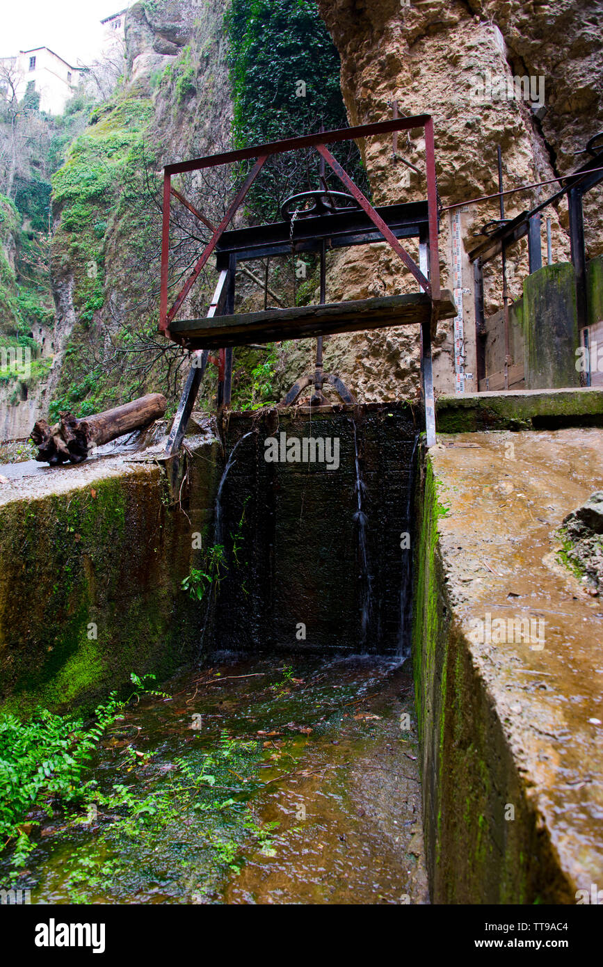 irrigation sluice system with rusty shutoff wheel in ronda, andalusia ...