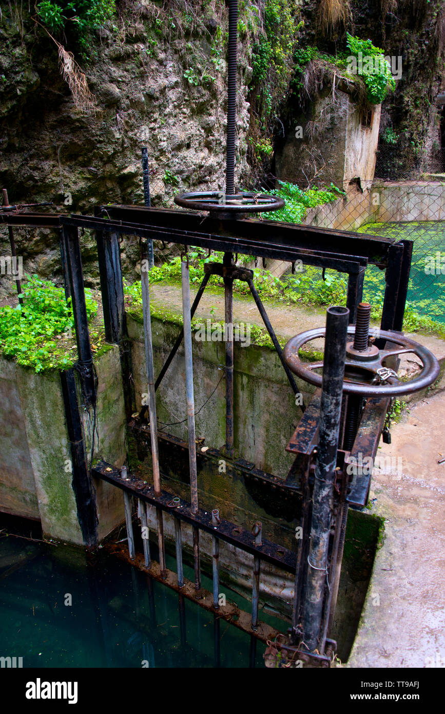 irrigation sluice system with rusty shutoff wheel in ronda, andalusia ...