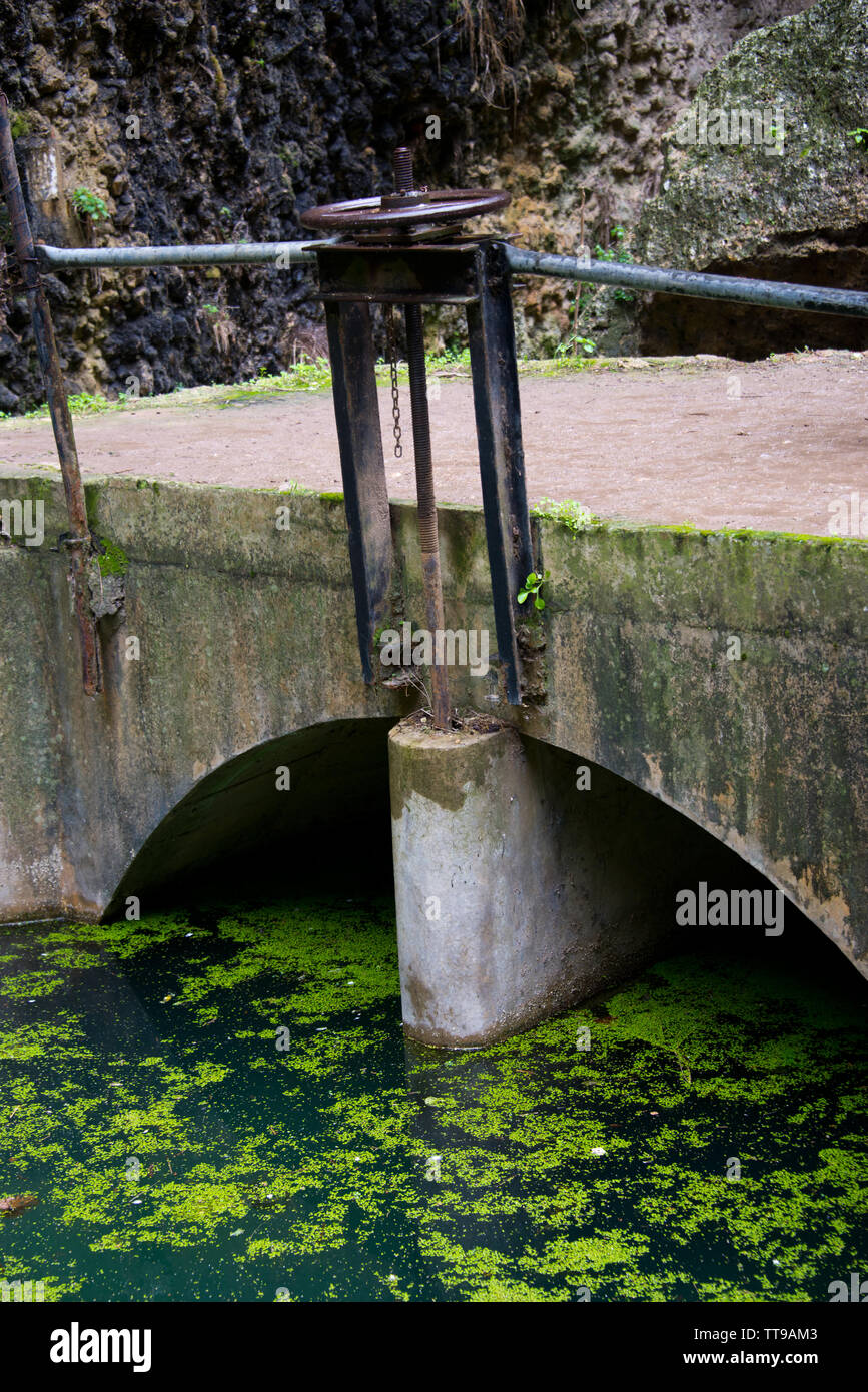 irrigation sluice system with rusty shutoff wheel in ronda, andalusia ...