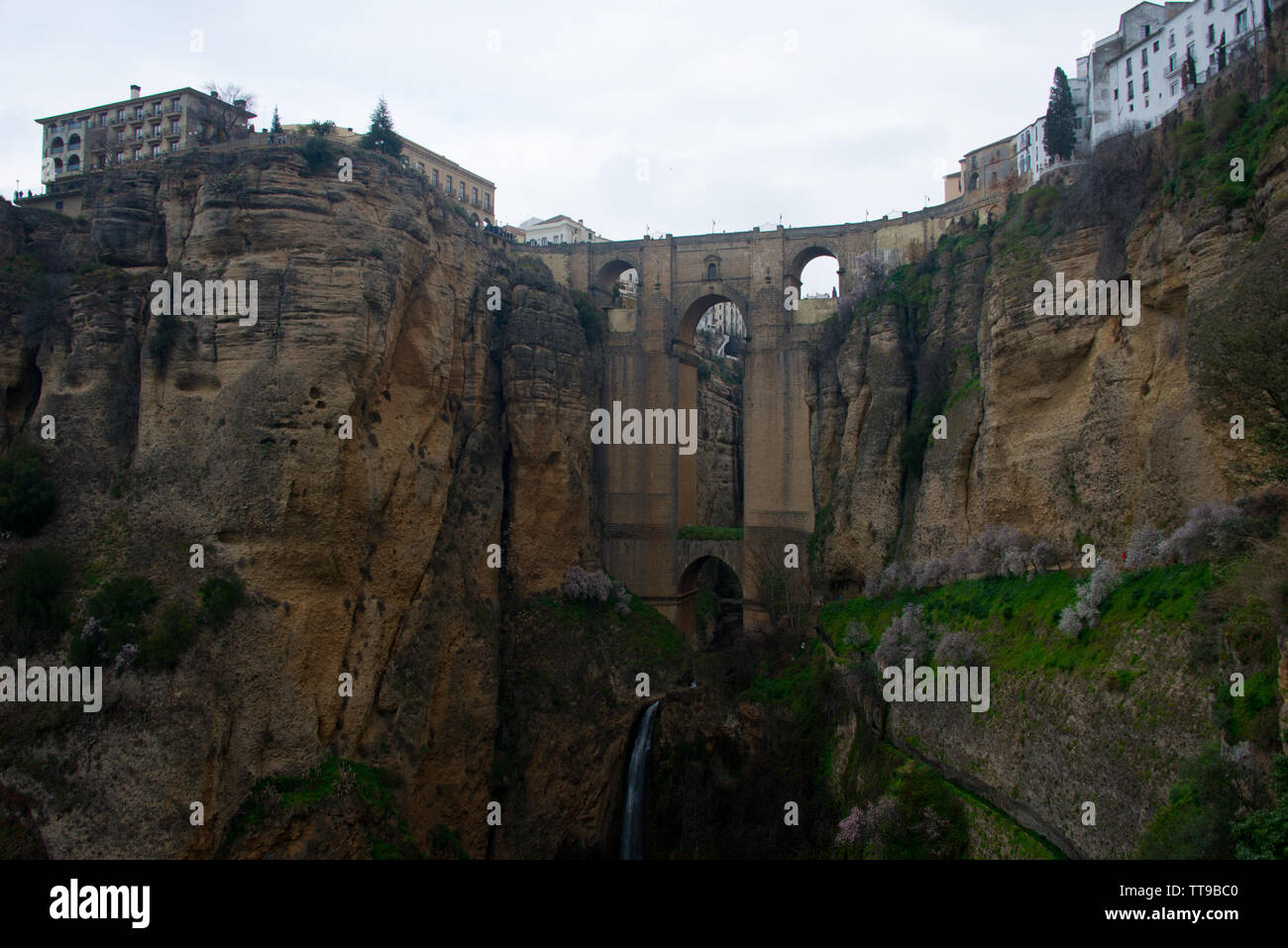 ancient bridge, connecting old and new part of andalusian town ronda ...
