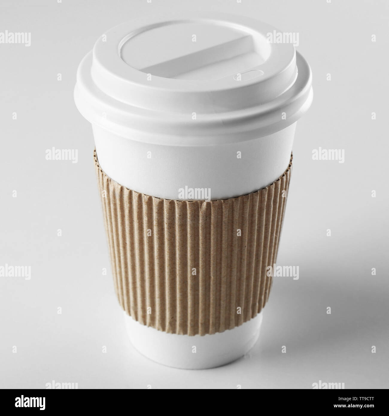 Paper cup of coffee isolated on white Stock Photo - Alamy