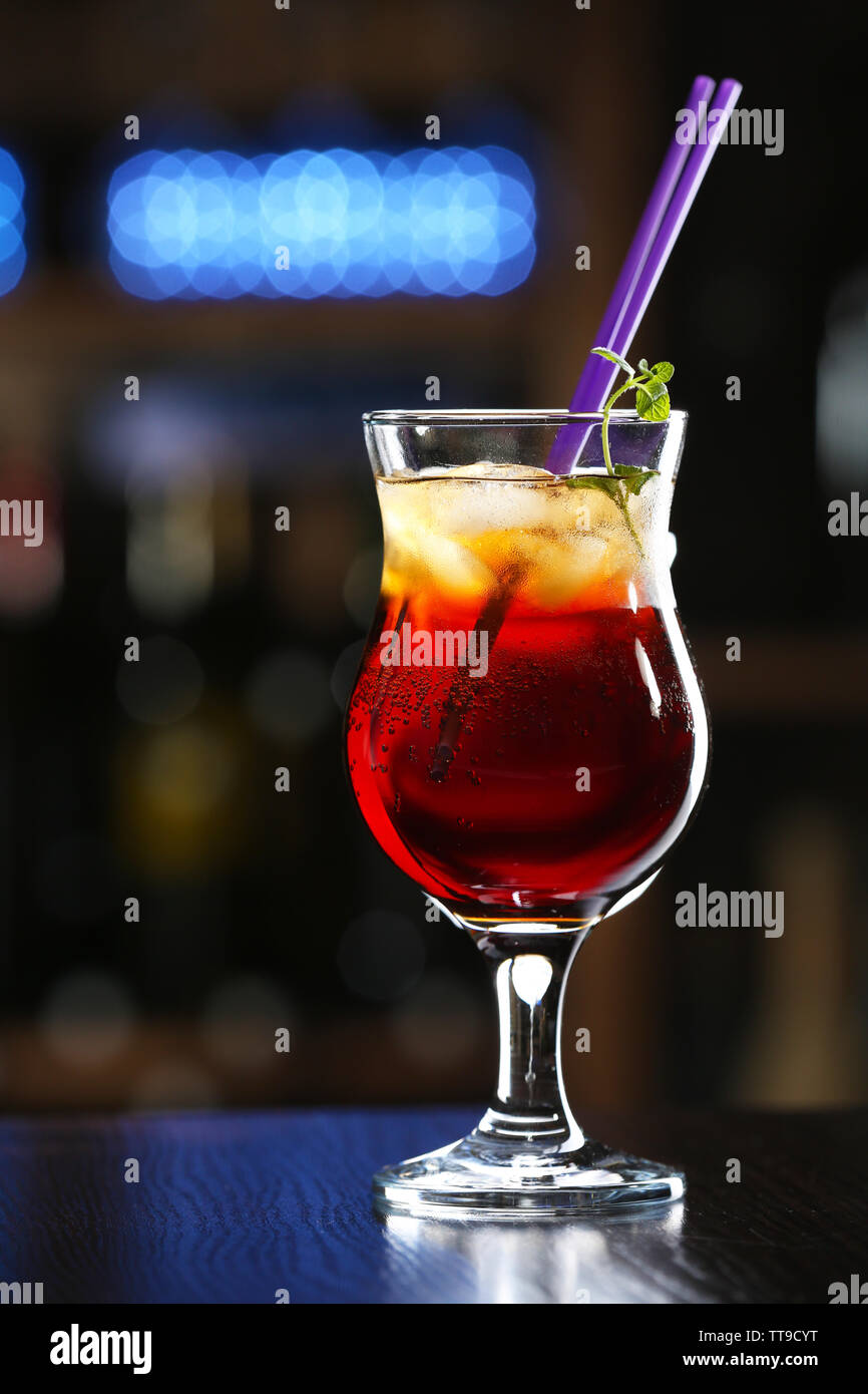 Glass of cocktails on bar background Stock Photo - Alamy