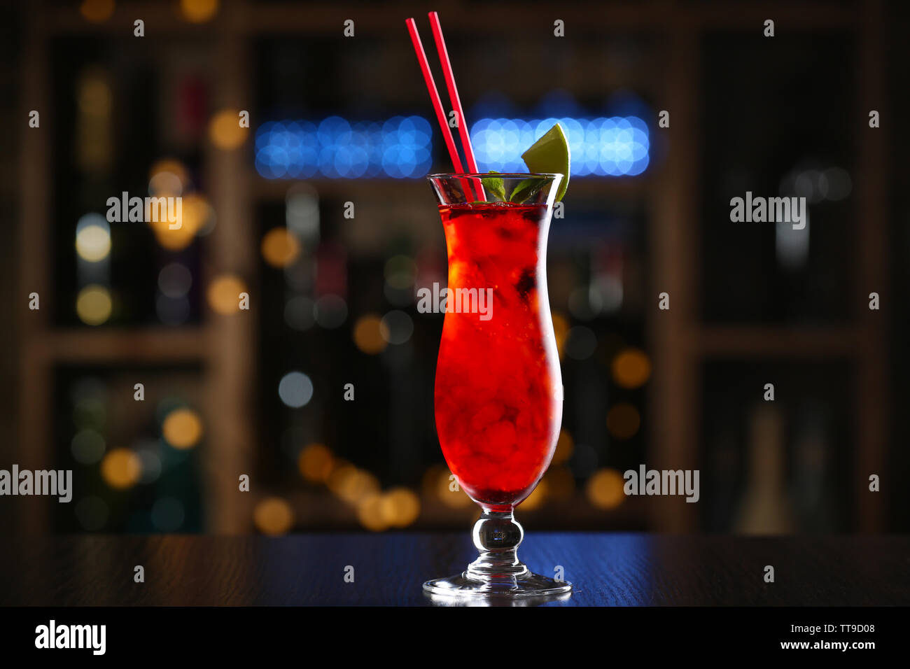 Glass of cocktails on bar background Stock Photo - Alamy