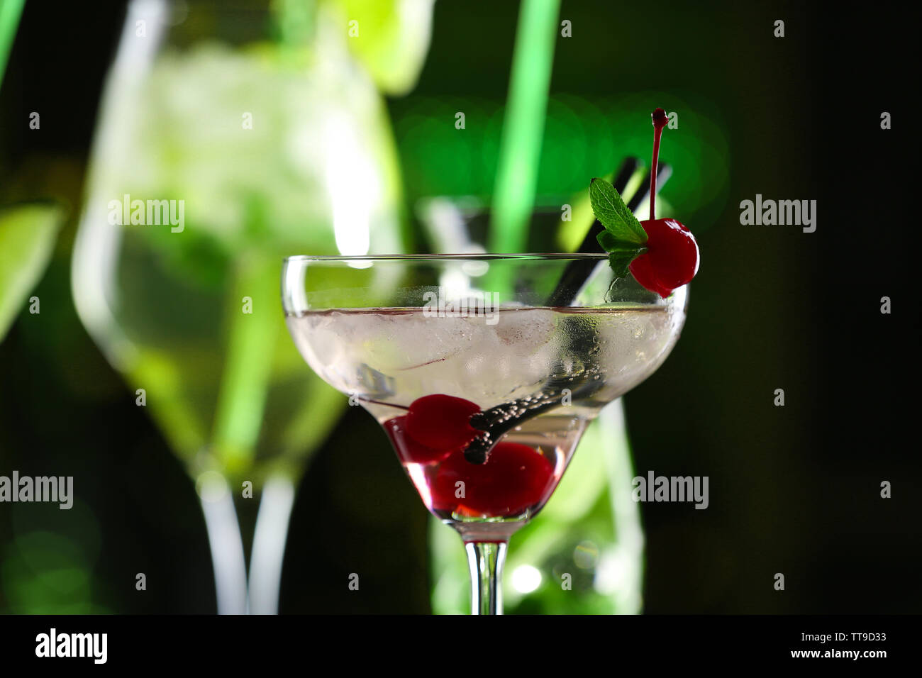 Glasses of cocktails on bar background Stock Photo - Alamy