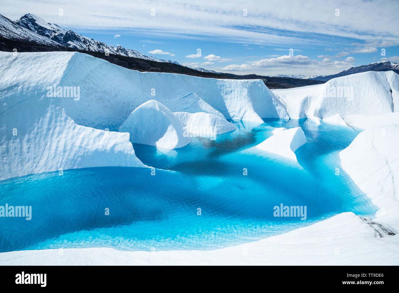 Crystal blue waters of a supraglacial lake on the Matanuska Glacier ...