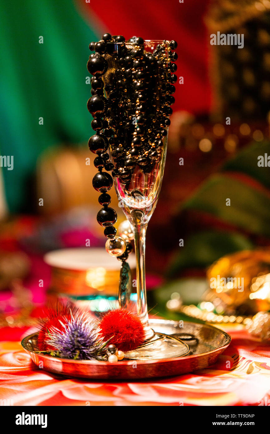 Champagne Glass filled with Pearls Stock Photo - Alamy