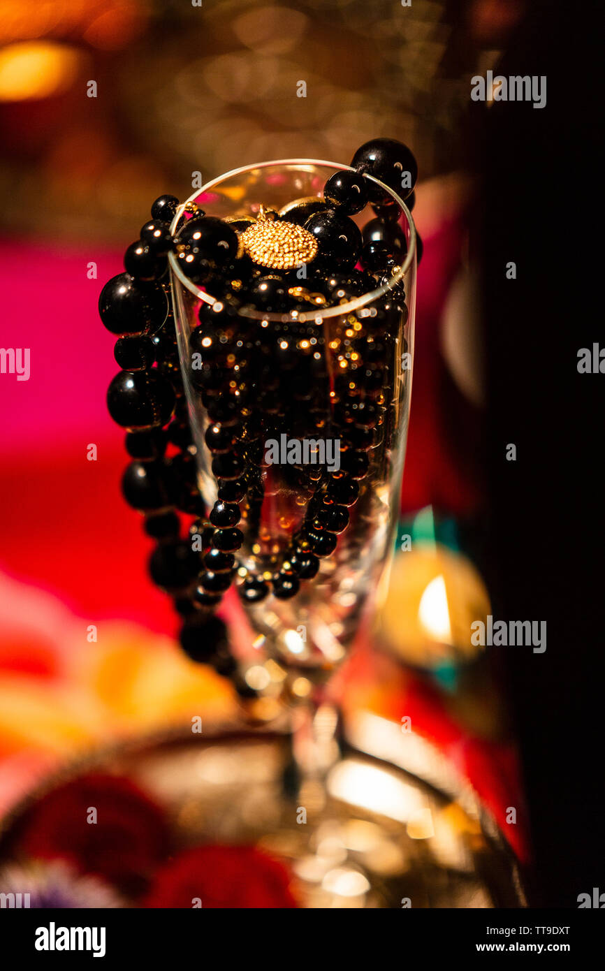 Champagne Glass filled with Pearls Stock Photo - Alamy