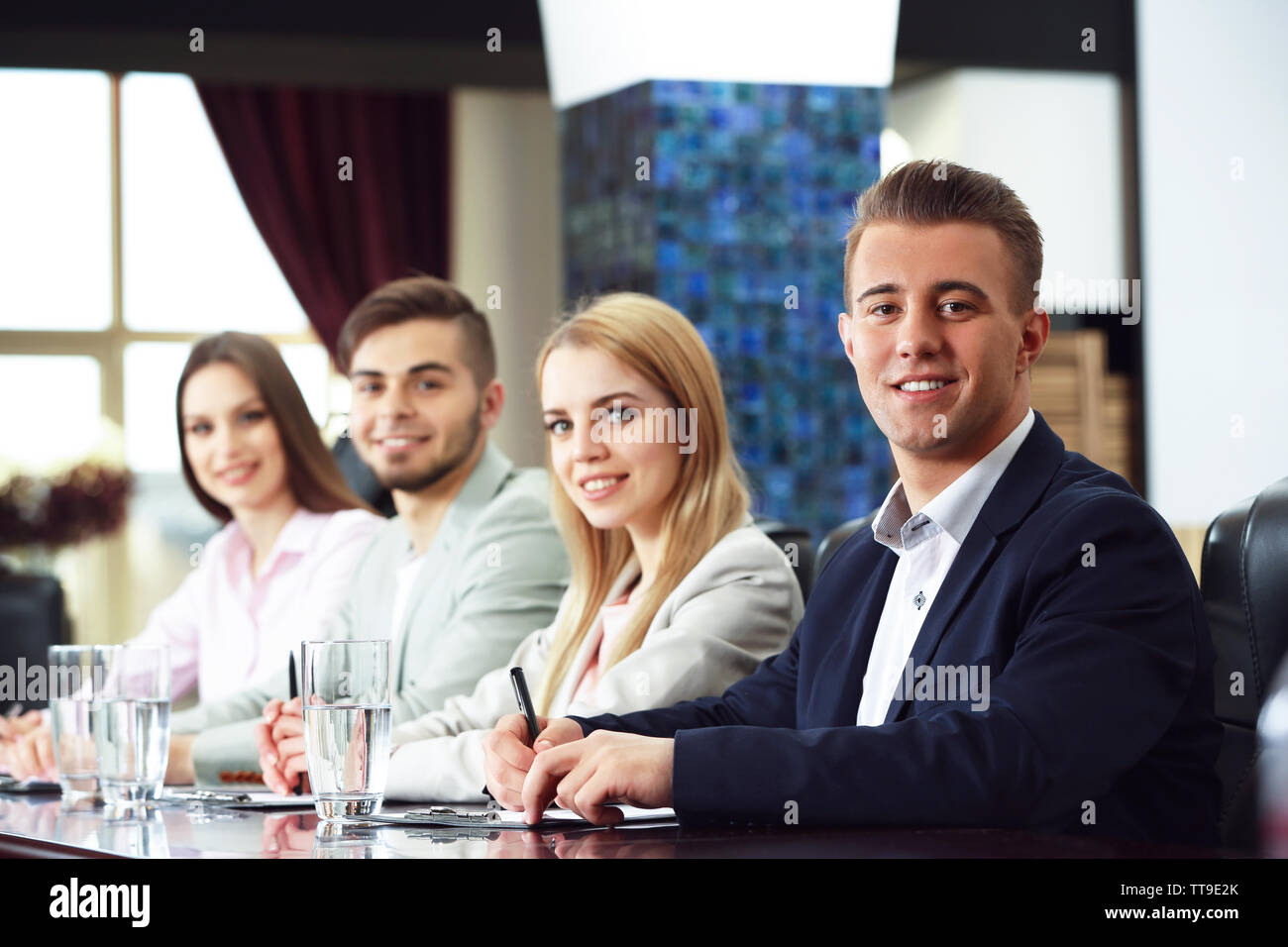 Business people working in conference room Stock Photo - Alamy