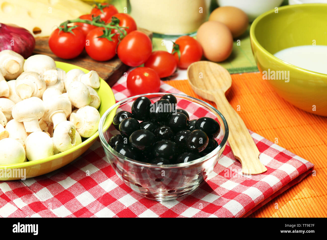 Food ingredients for cooking on table close up Stock Photo - Alamy