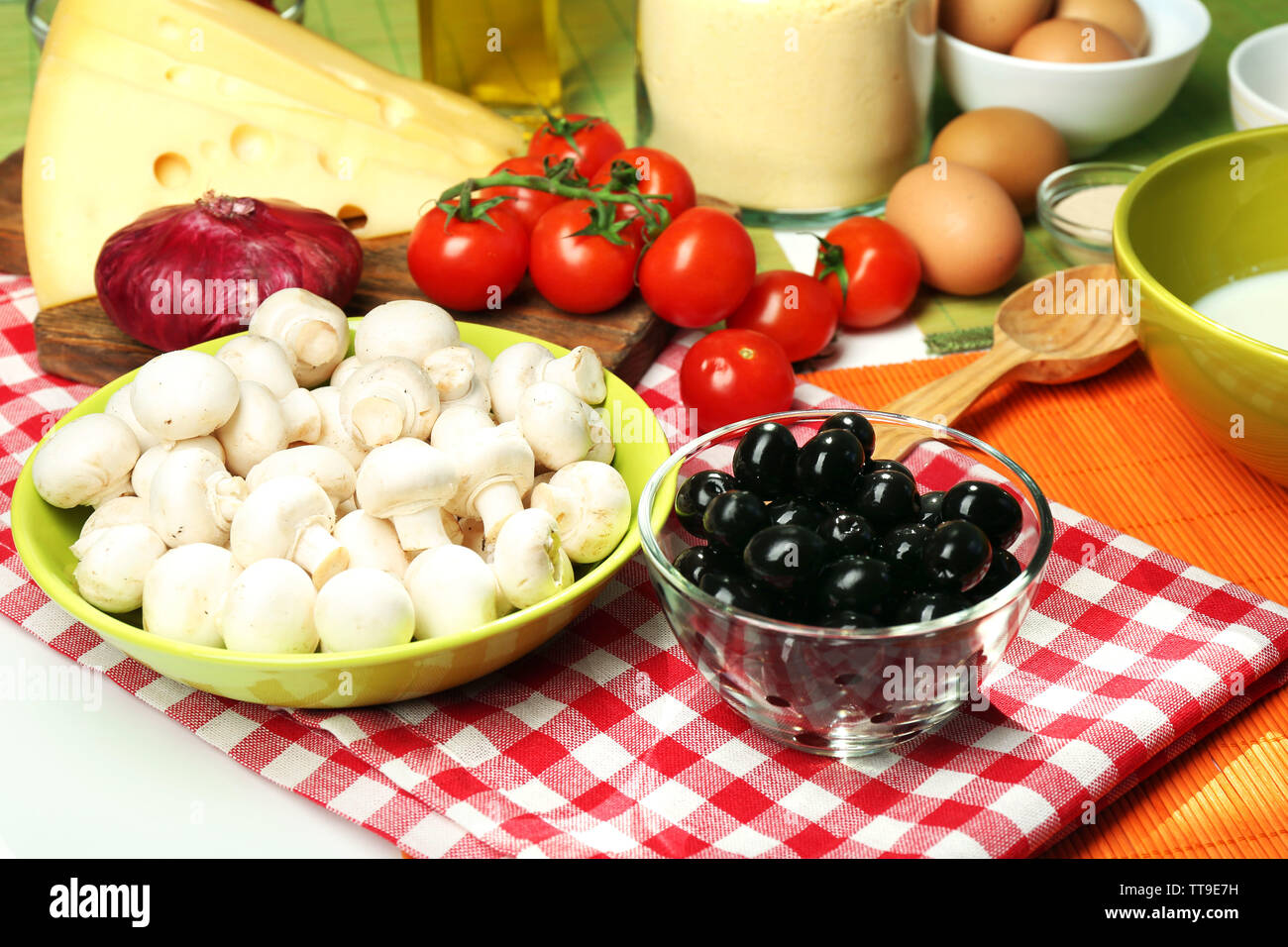 Food ingredients for cooking on table close up Stock Photo - Alamy