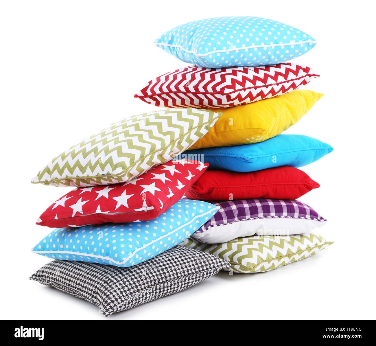 Stack of colorful pillows isolated on white Stock Photo - Alamy