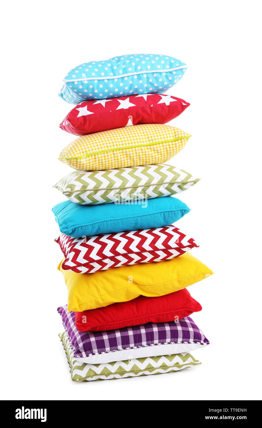 Stack of colorful pillows isolated on white Stock Photo - Alamy