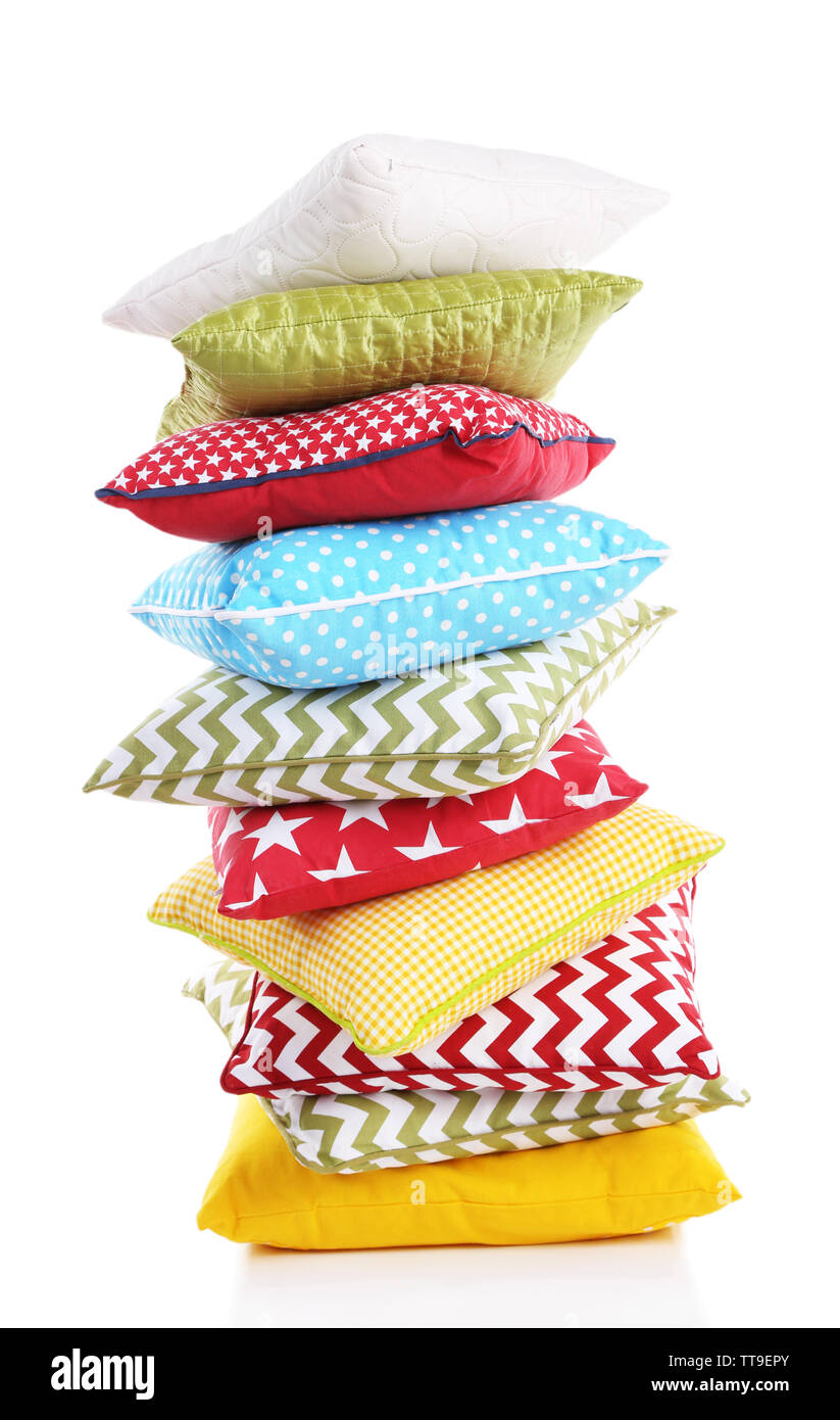 Stack of colorful pillows isolated on white Stock Photo - Alamy
