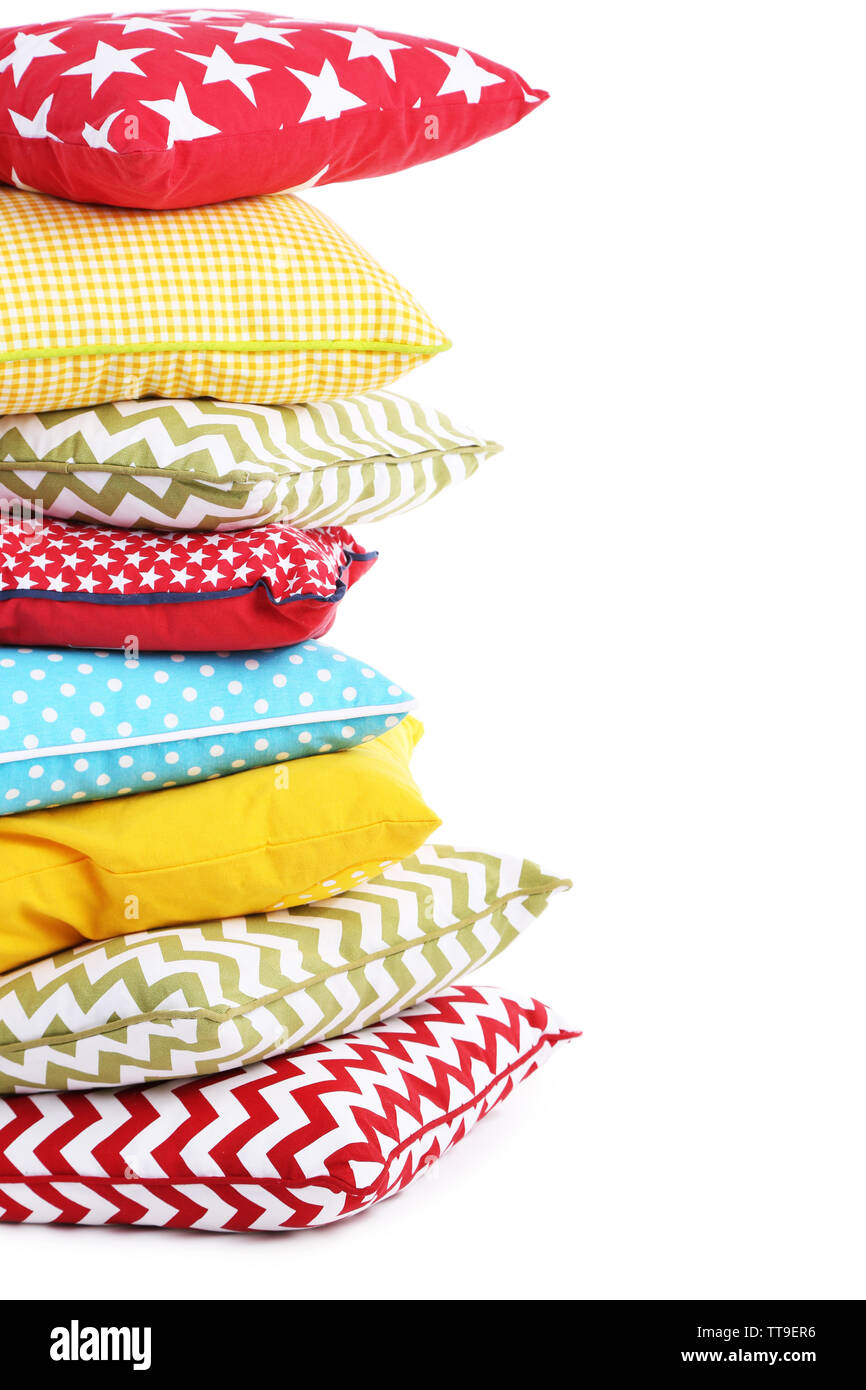 Stack of colorful pillows isolated on white Stock Photo - Alamy