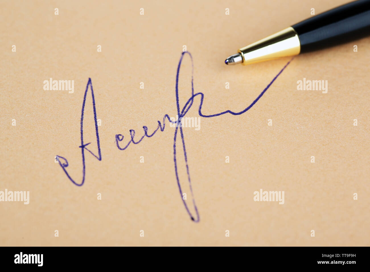 Signing sign ballpoint blue signature hi-res stock photography and ...