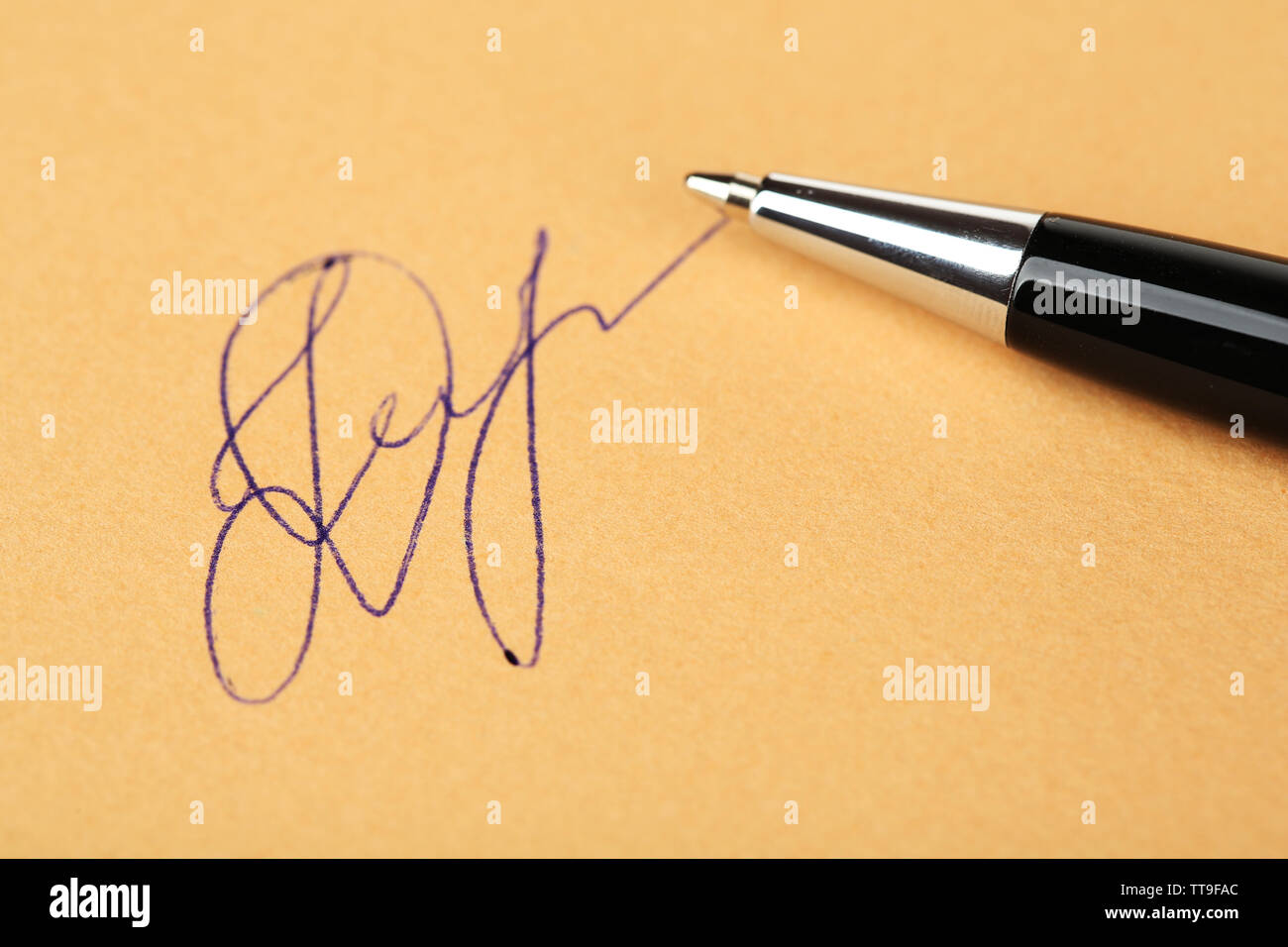 Signing sign ballpoint blue signature hi-res stock photography and ...