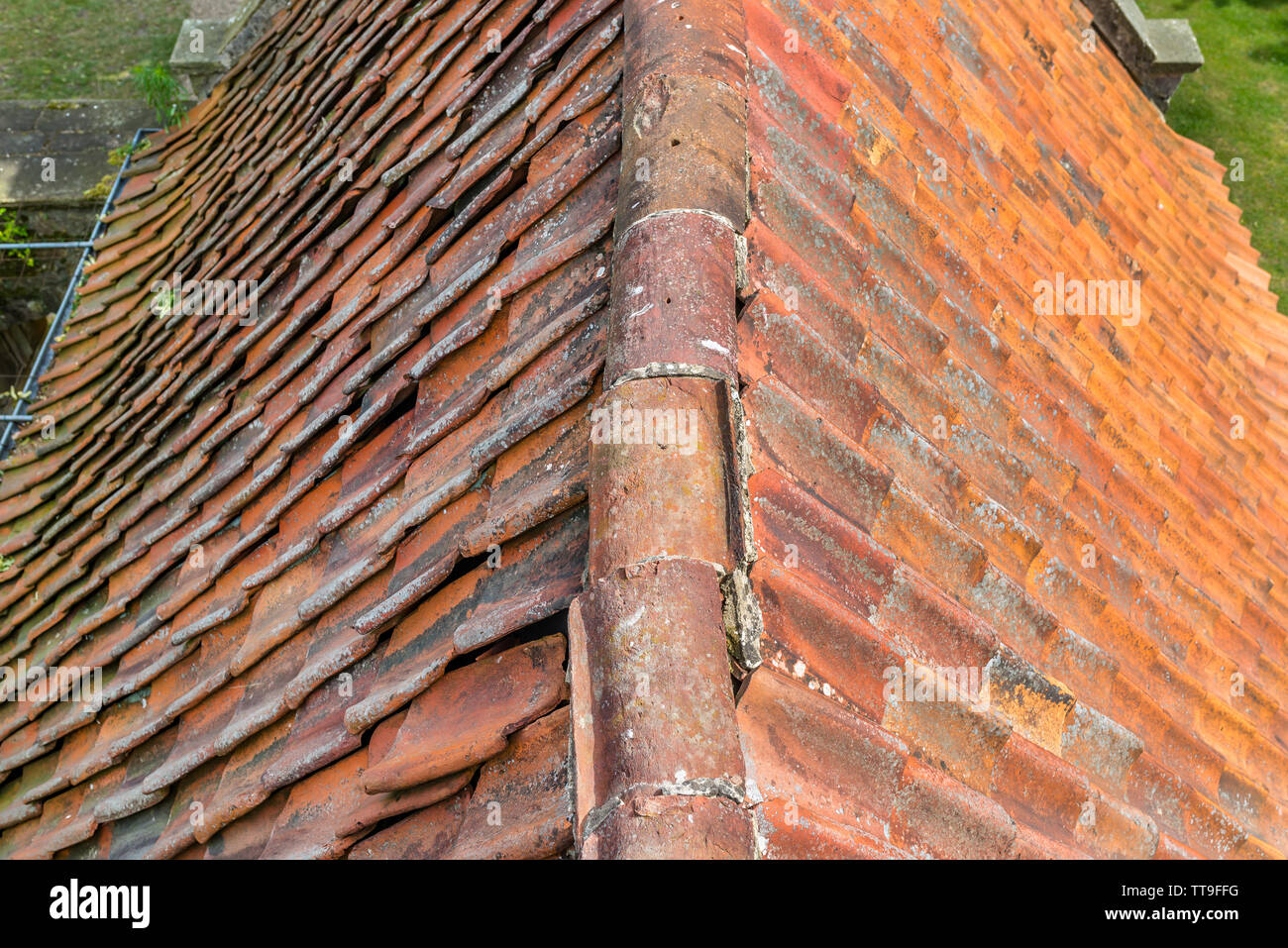 A red ceramic roof tile placed on an old building, photos taken up ...