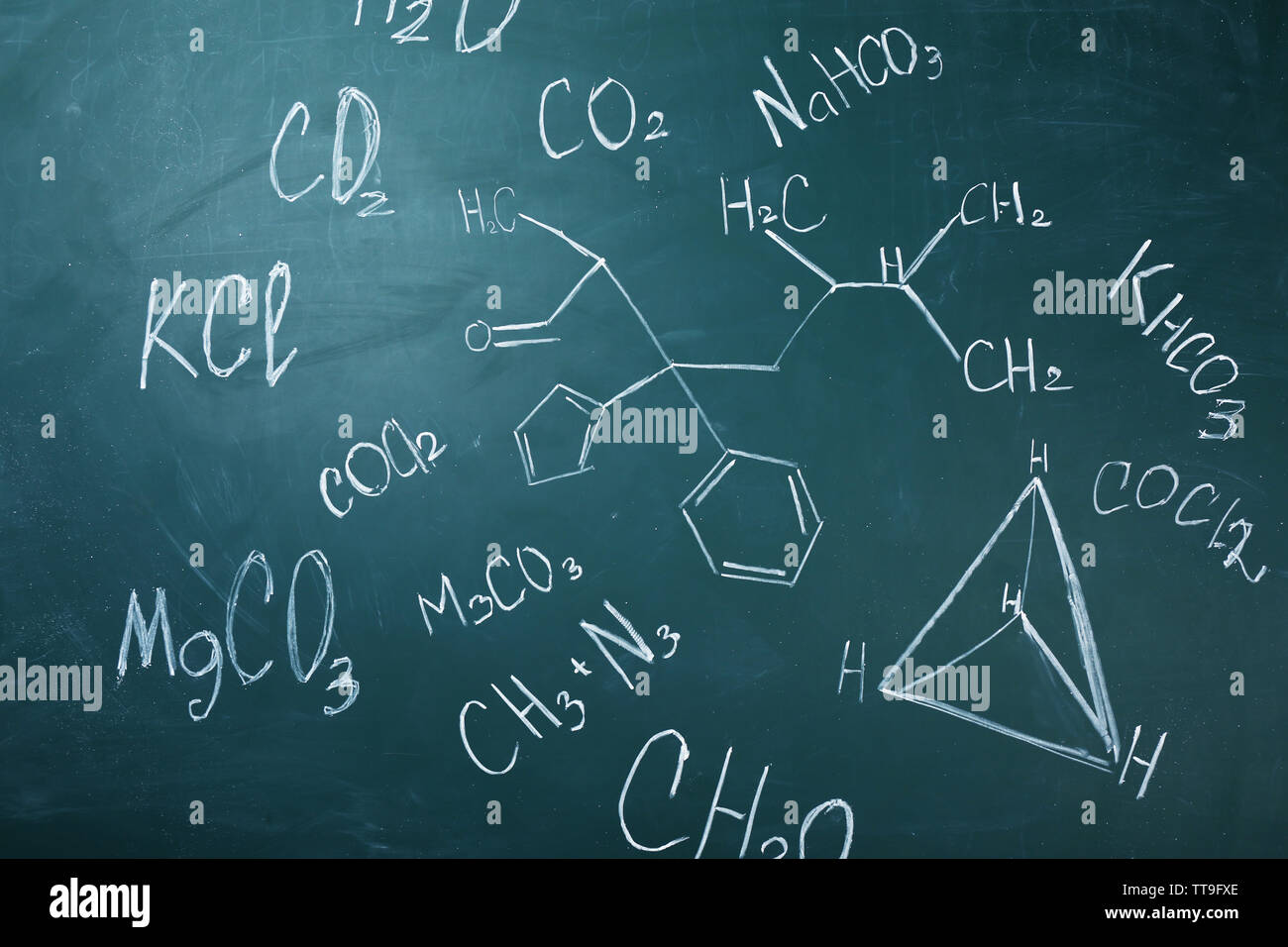 Molecule models and formulas on blackboard background Stock Photo - Alamy