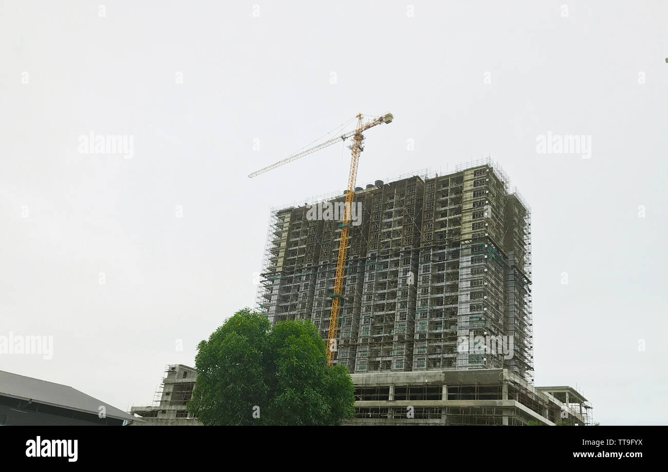 Construction progress of tall building Stock Photo - Alamy