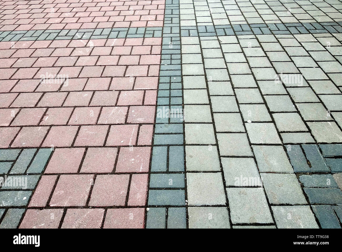 Stone pavement in perspective. Granite cobblestone pavement tiles Stock ...