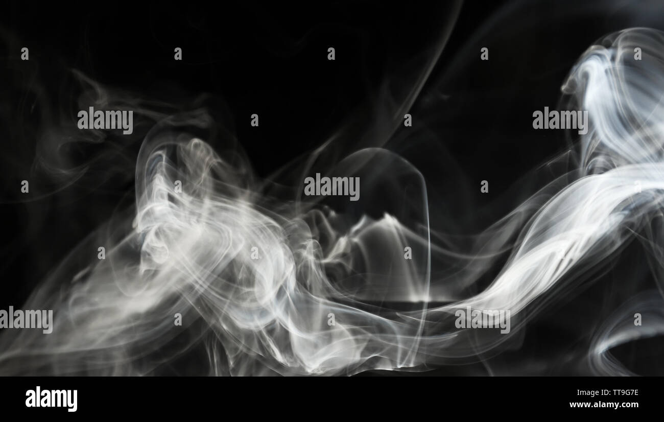 Color smoke from match on dark background Stock Photo - Alamy