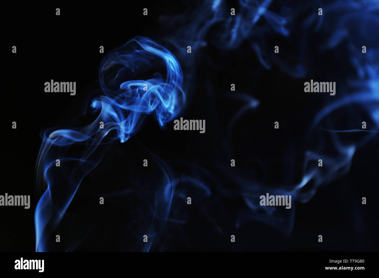 Color smoke from match on dark background Stock Photo - Alamy