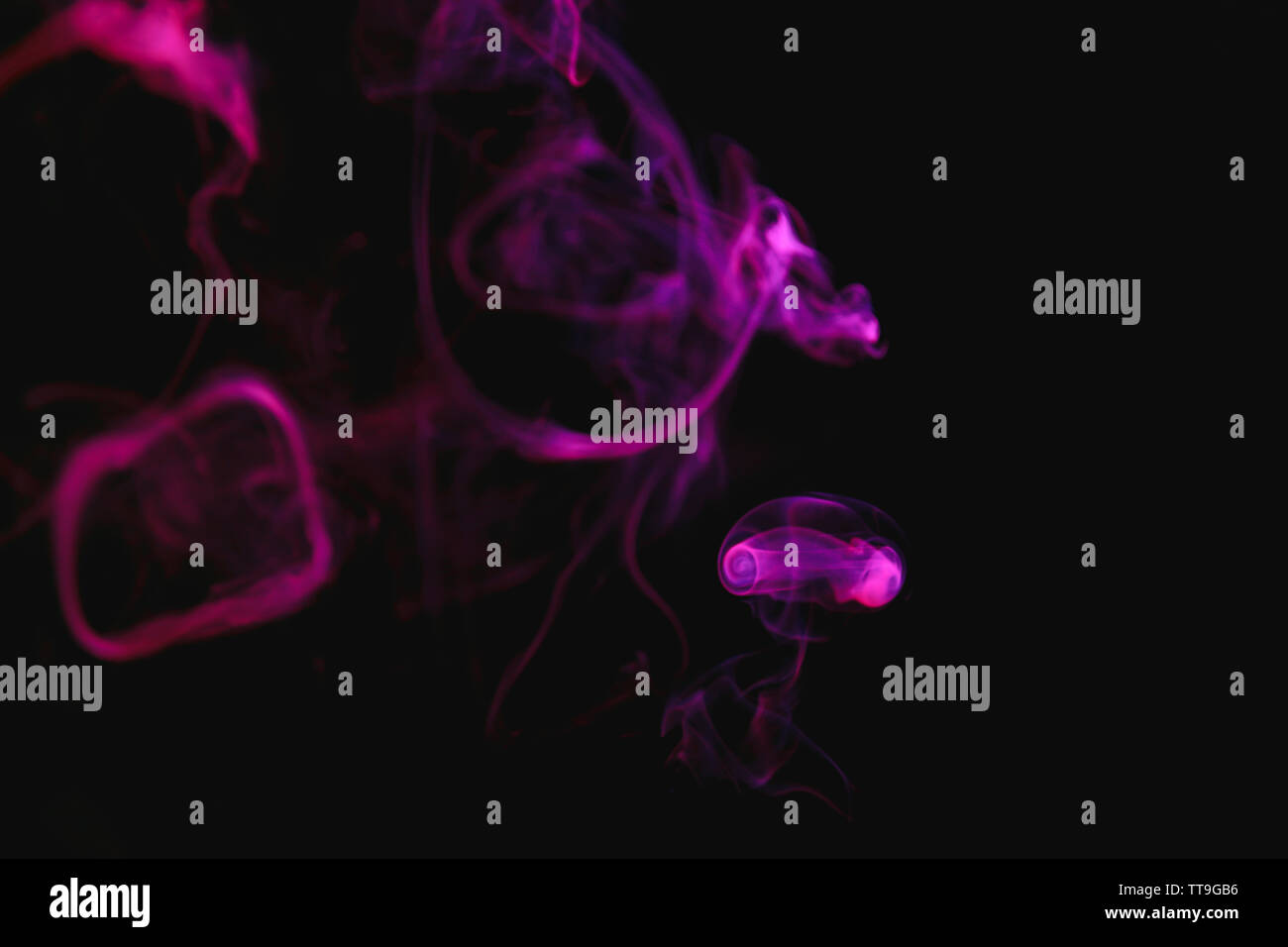 Color smoke from match on dark background Stock Photo - Alamy