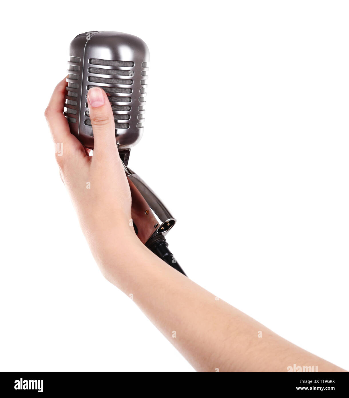 Retro microphone in female hand isolated on white Stock Photo - Alamy