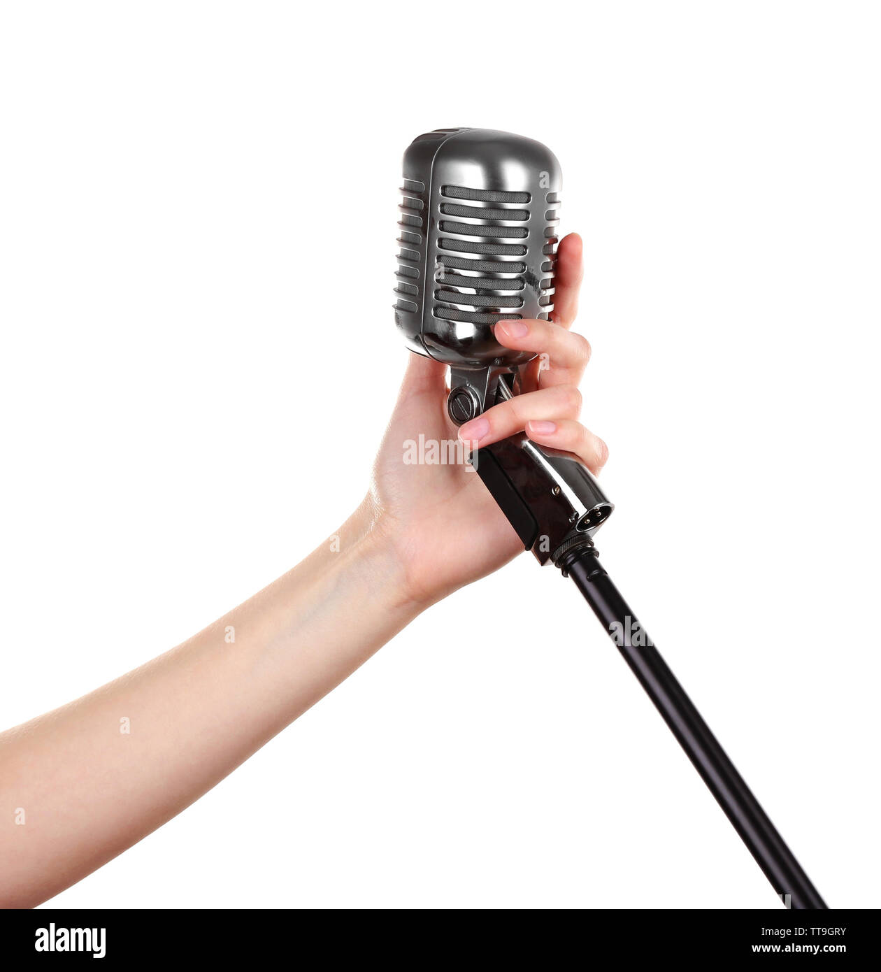 Retro microphone in female hand isolated on white Stock Photo - Alamy