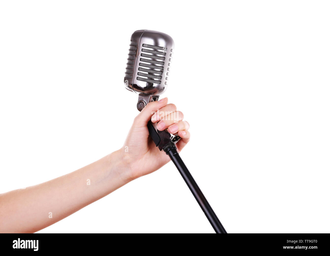 Retro microphone in female hand isolated on white Stock Photo - Alamy