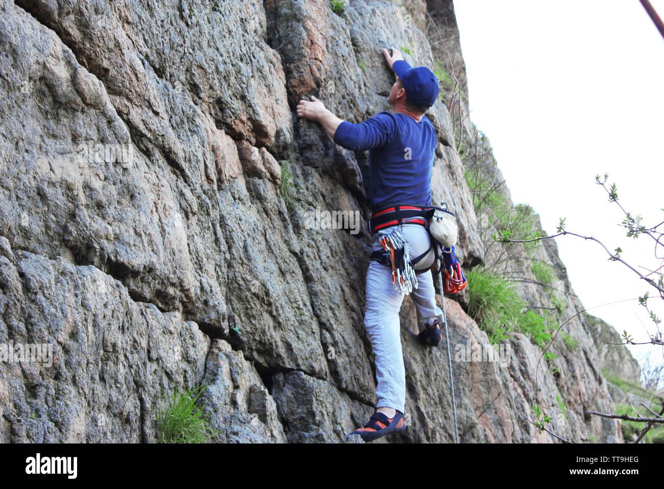 Rock climber on route Stock Photo - Alamy