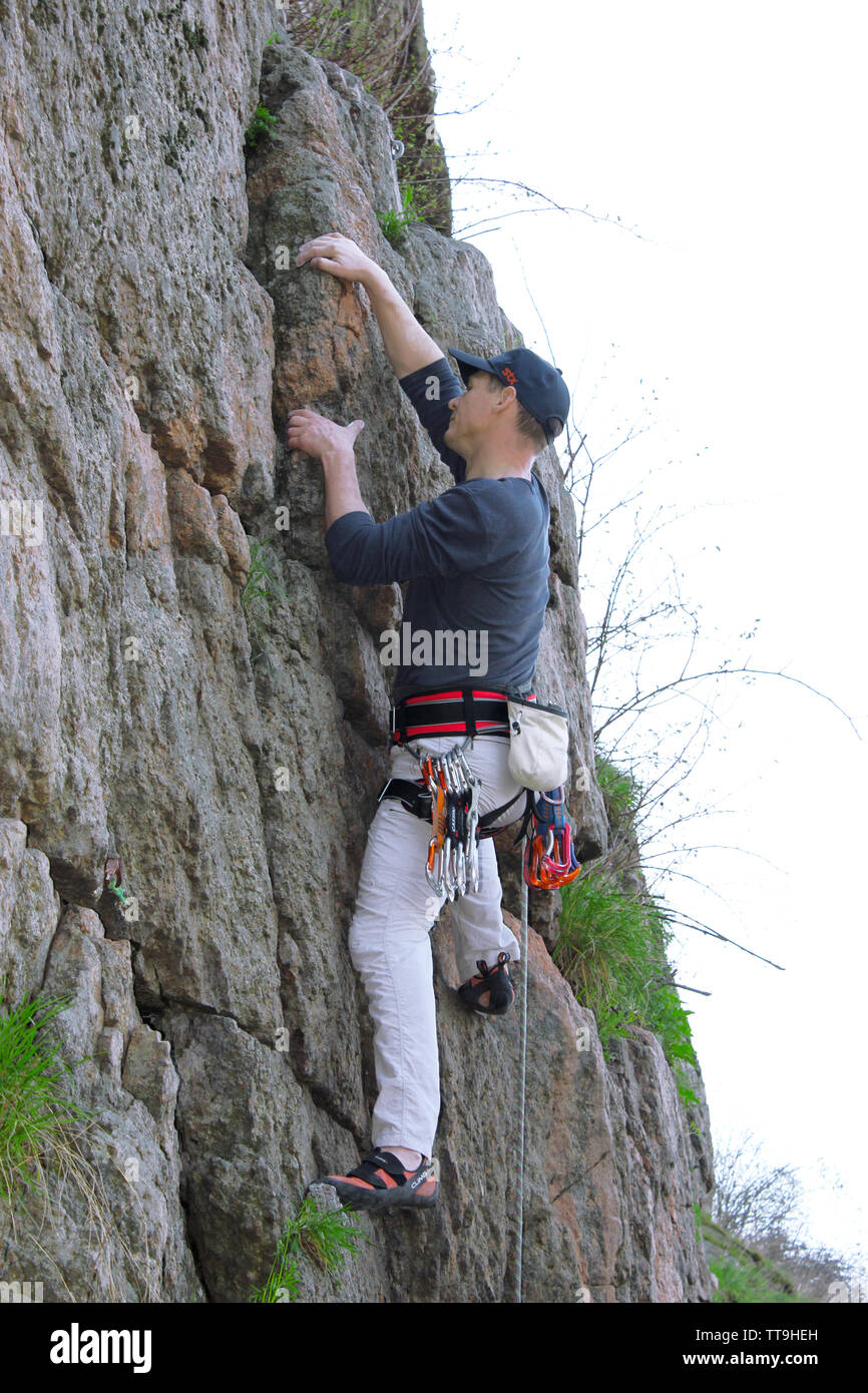 Rock climber on route Stock Photo - Alamy