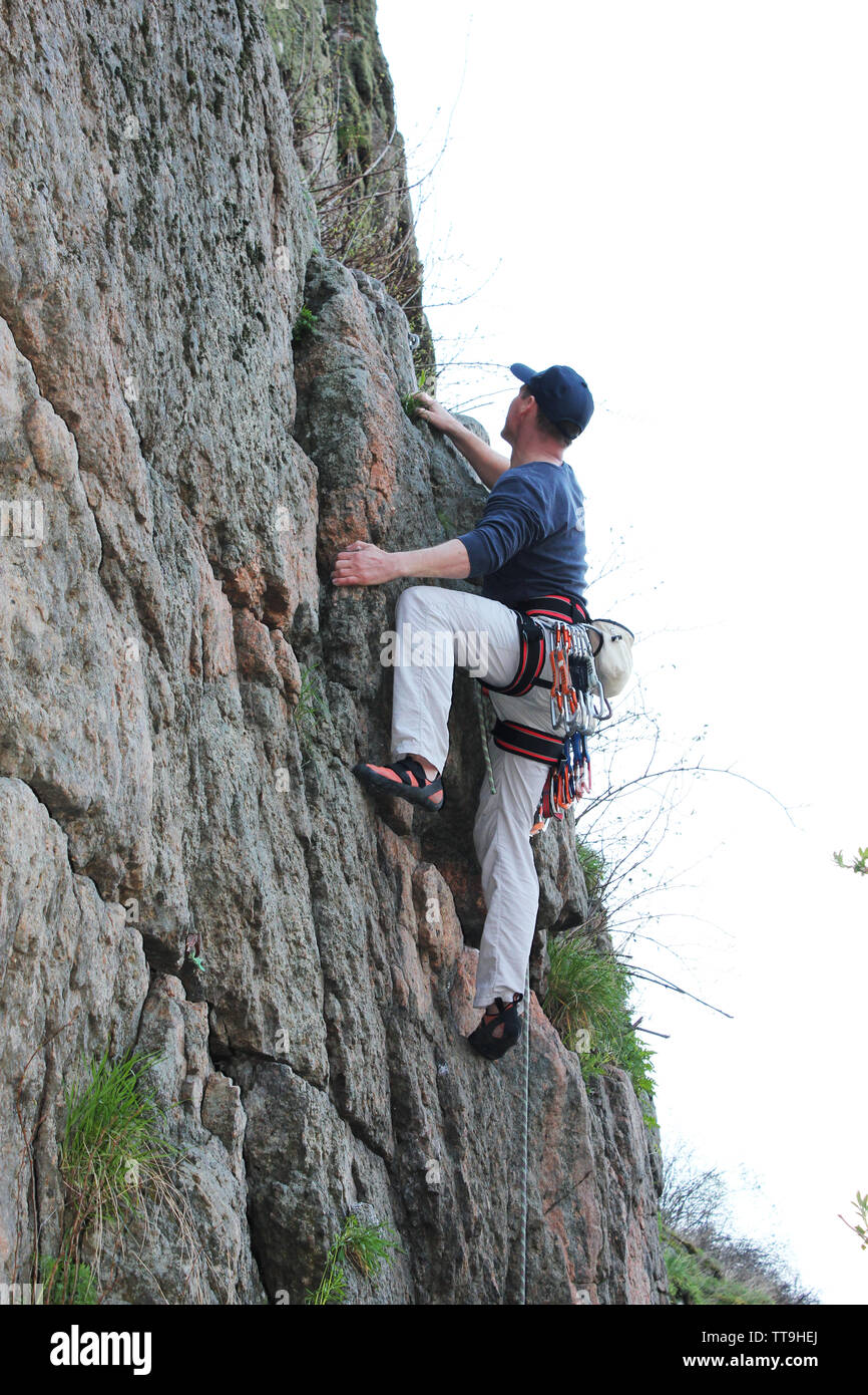 Rock climber on route Stock Photo - Alamy