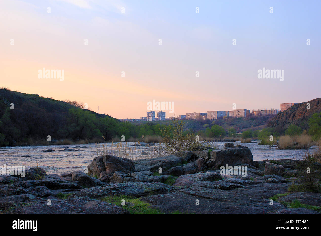 Spring landscape with river, stones and trees Stock Photo - Alamy