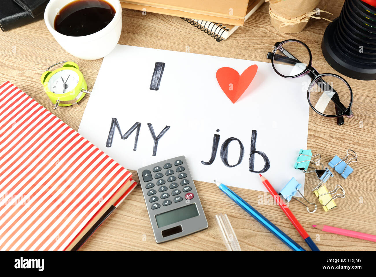 Inscription I love my job on workplace Stock Photo - Alamy