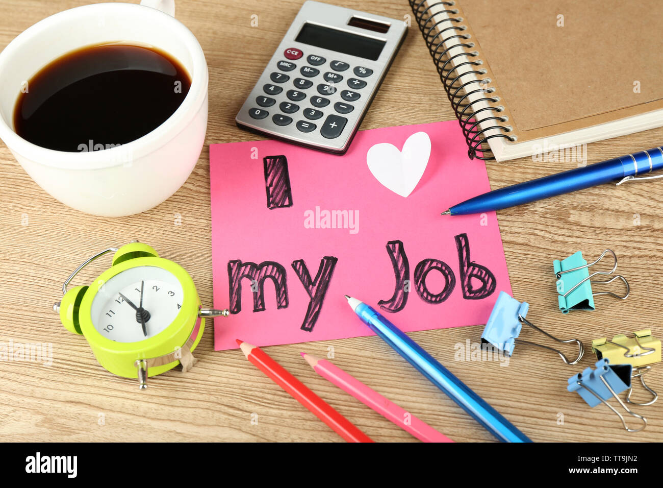 Inscription I love my job on workplace Stock Photo - Alamy