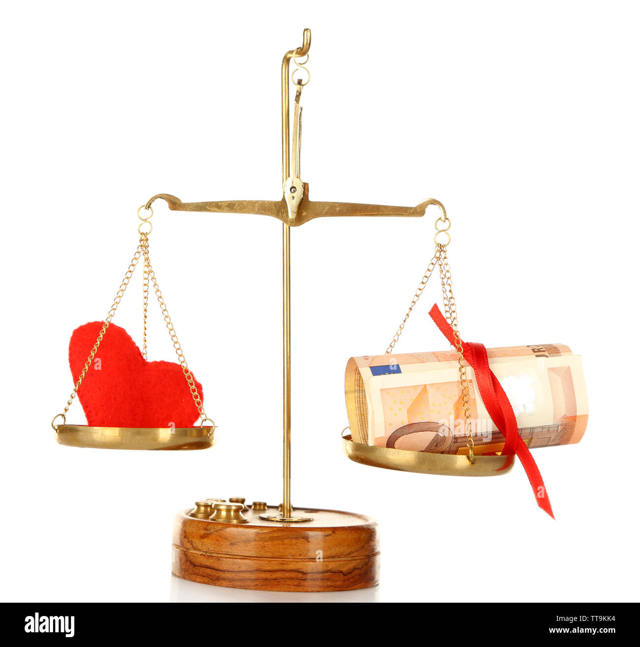 Scale money heart hi-res stock photography and images - Alamy