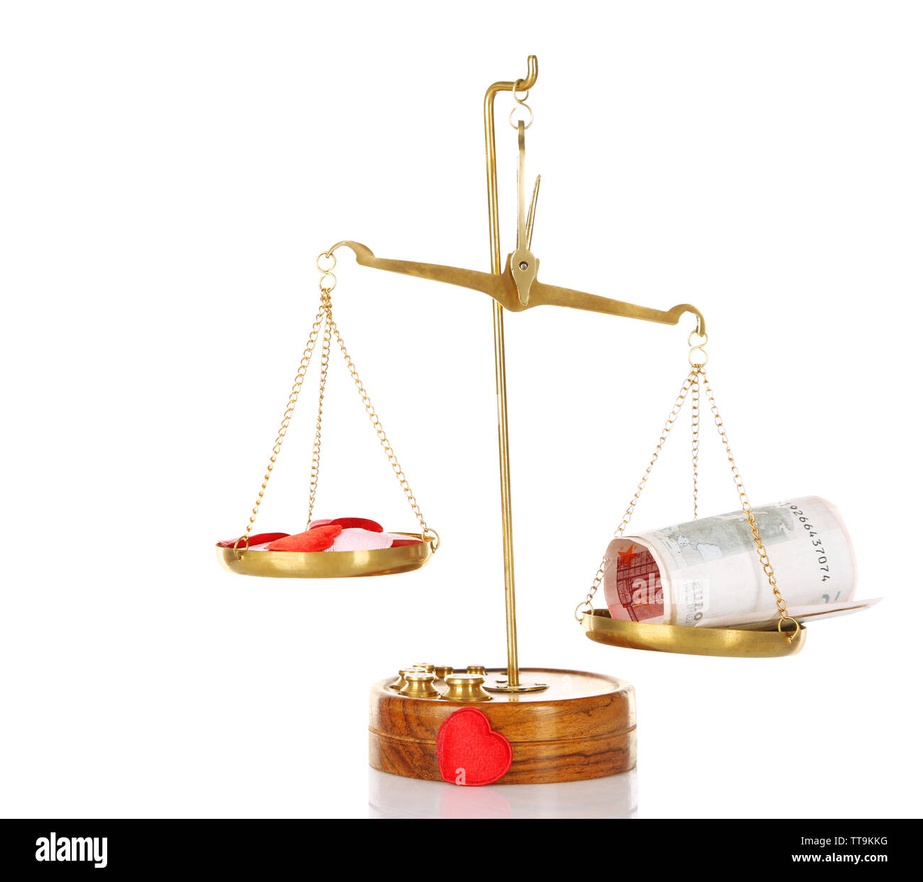 Scale money heart hi-res stock photography and images - Alamy